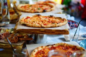 How to (Properly) Host a Pizza Party: Tips, Tricks & Toppings